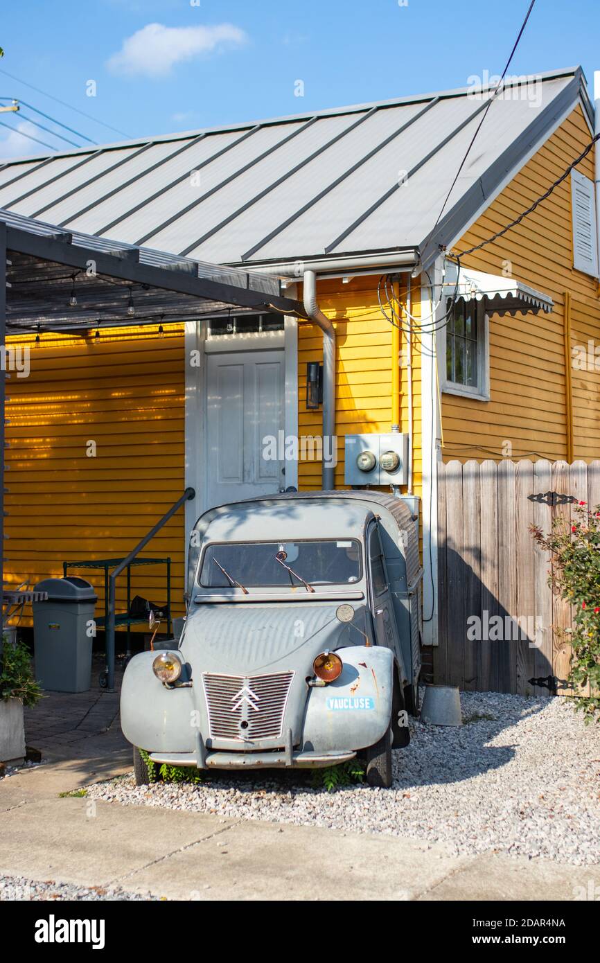 old vintage Citroen 2CV in front of painted house or cafe in New ...