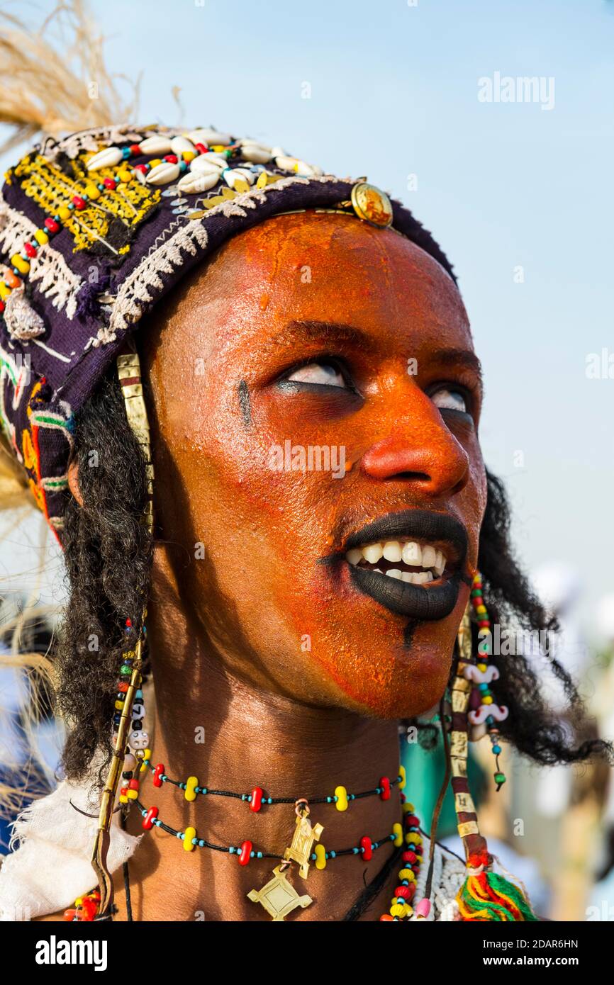 Wodaabe-Bororo man with face painted at the annual Gerewol festival ...