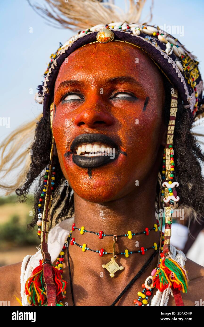 Wodaabe-Bororo man with face painted at the annual Gerewol festival ...