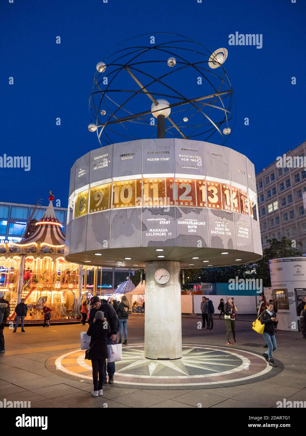 Illuminated world time clock at the blue hour, Berlin, Germany Stock ...