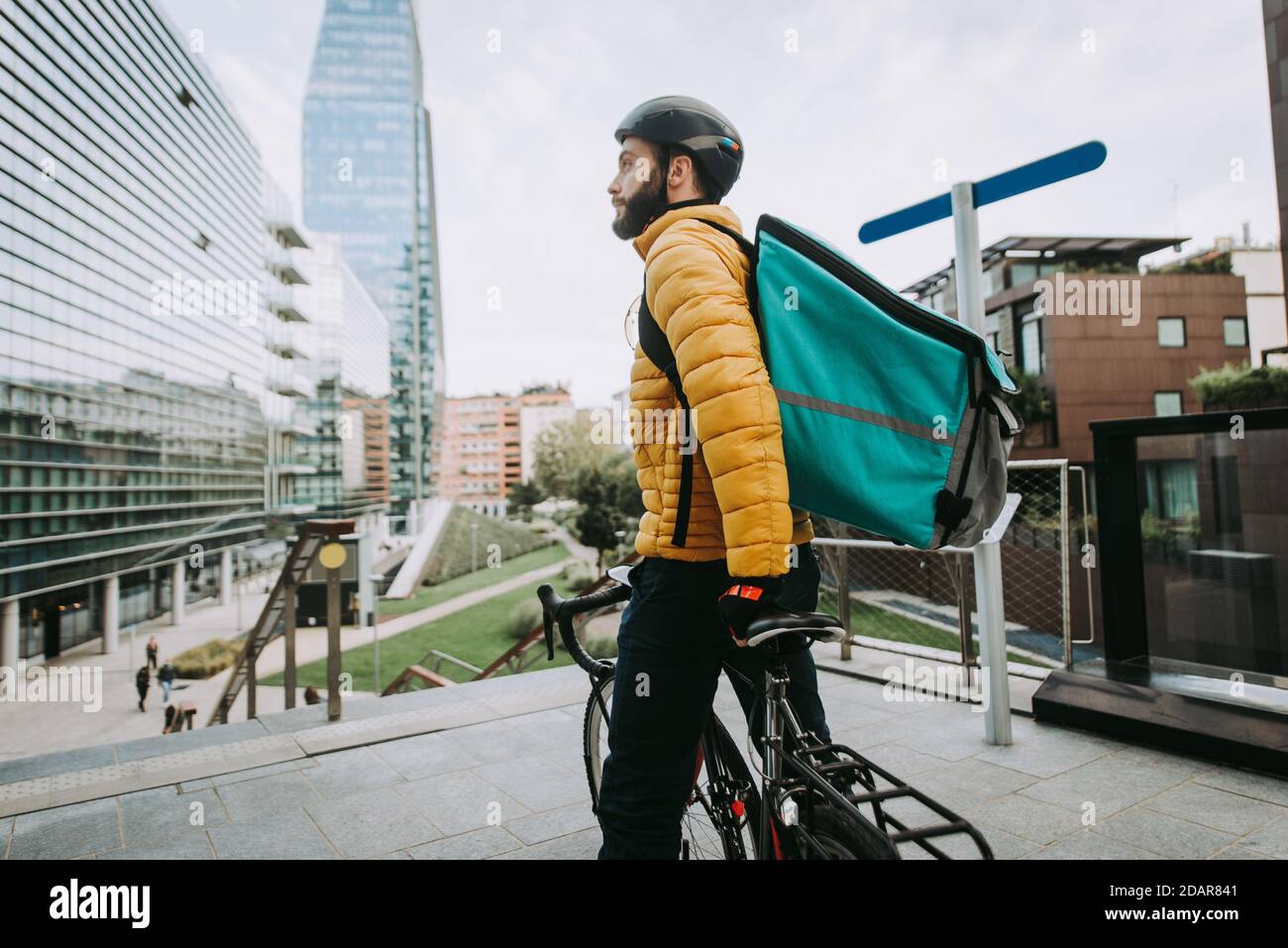 Food delivery service, rider delivering food to clints with bicycle ...