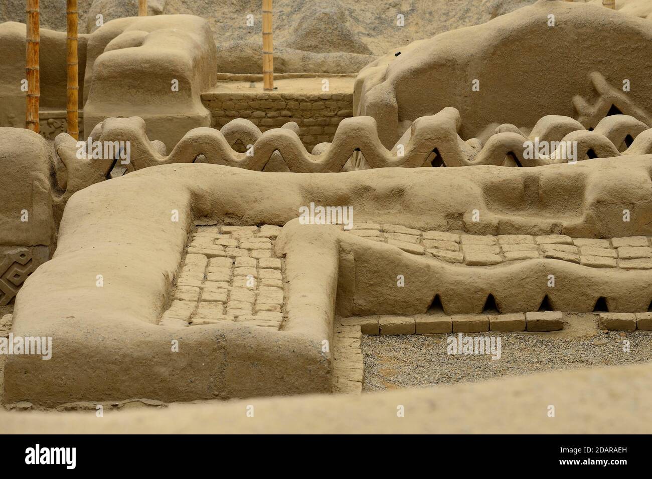 Artistic walls made of mud brick, adobe, ruins of Chan Chan, Trujillo ...