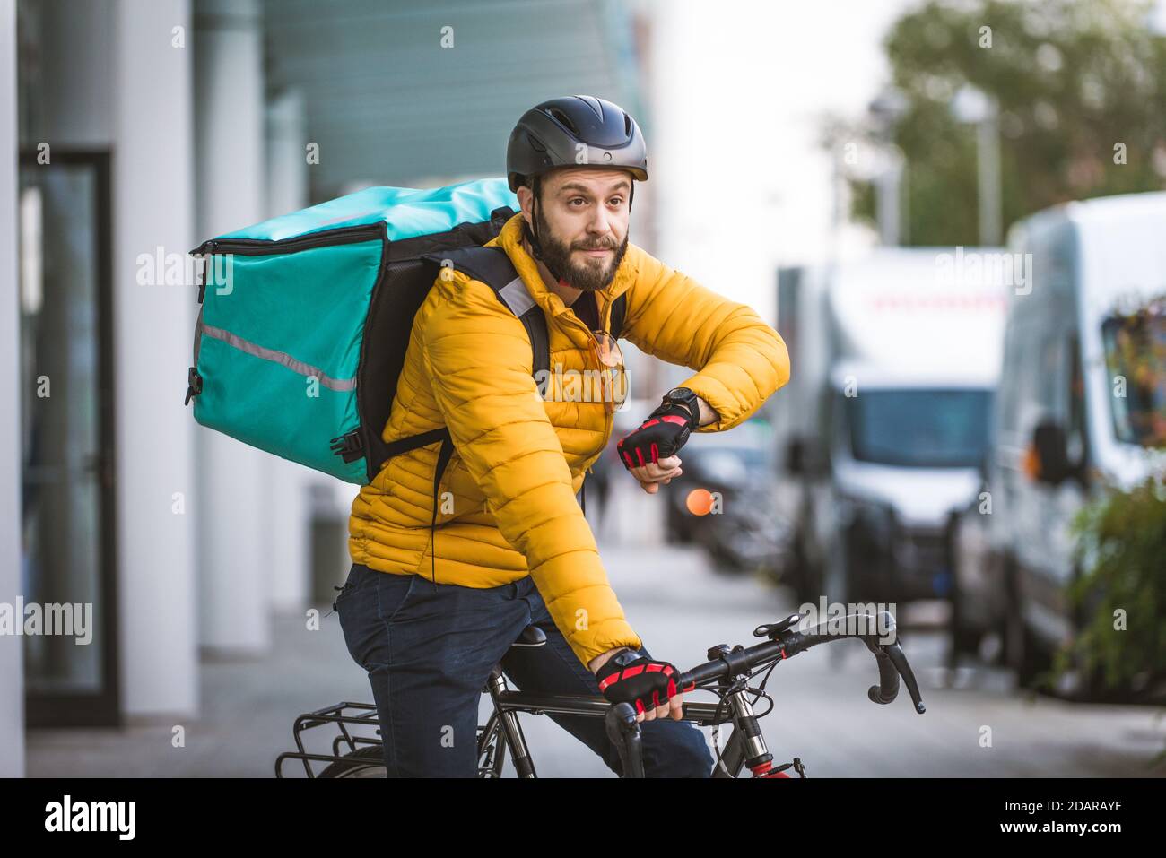 Food delivery service, rider delivering food to clints with bicycle ...