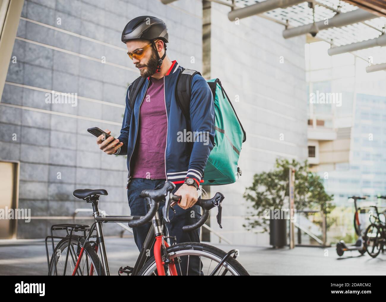 Food delivery service, rider delivering food to clints with bicycle ...