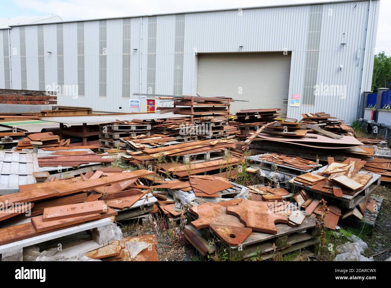 Scrap metal yard stack of steel and iron girders and plates Stock Photo ...