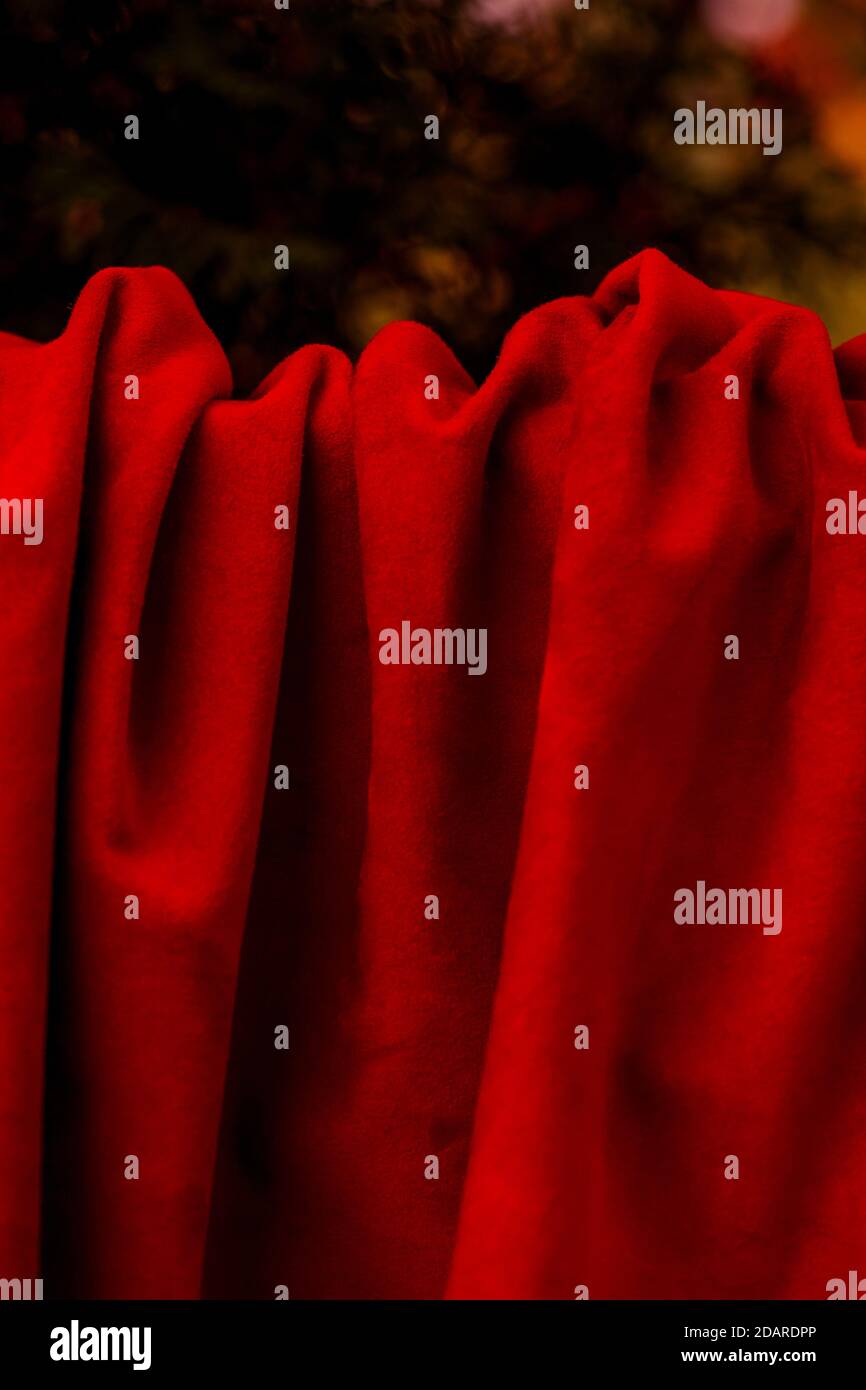 Red matte background of suede fabric, closeup. Velvet texture of ...