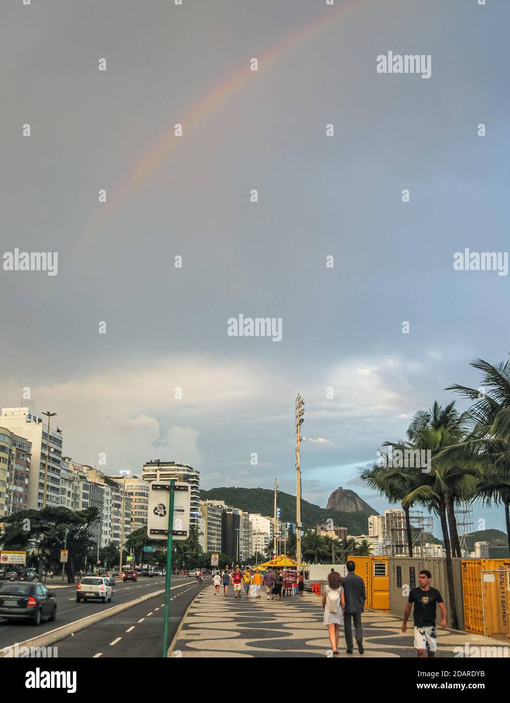 Rio de Janeiro Brazil - December 24, 2008: Rainbow in dark rainy sky ...