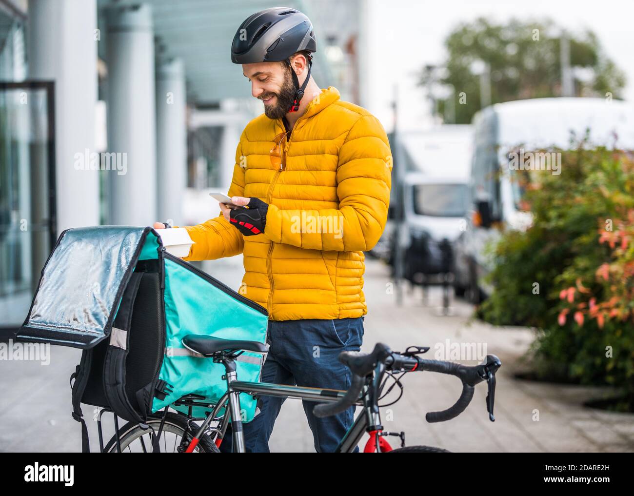 Food delivery service, rider delivering food to clints with bicycle ...