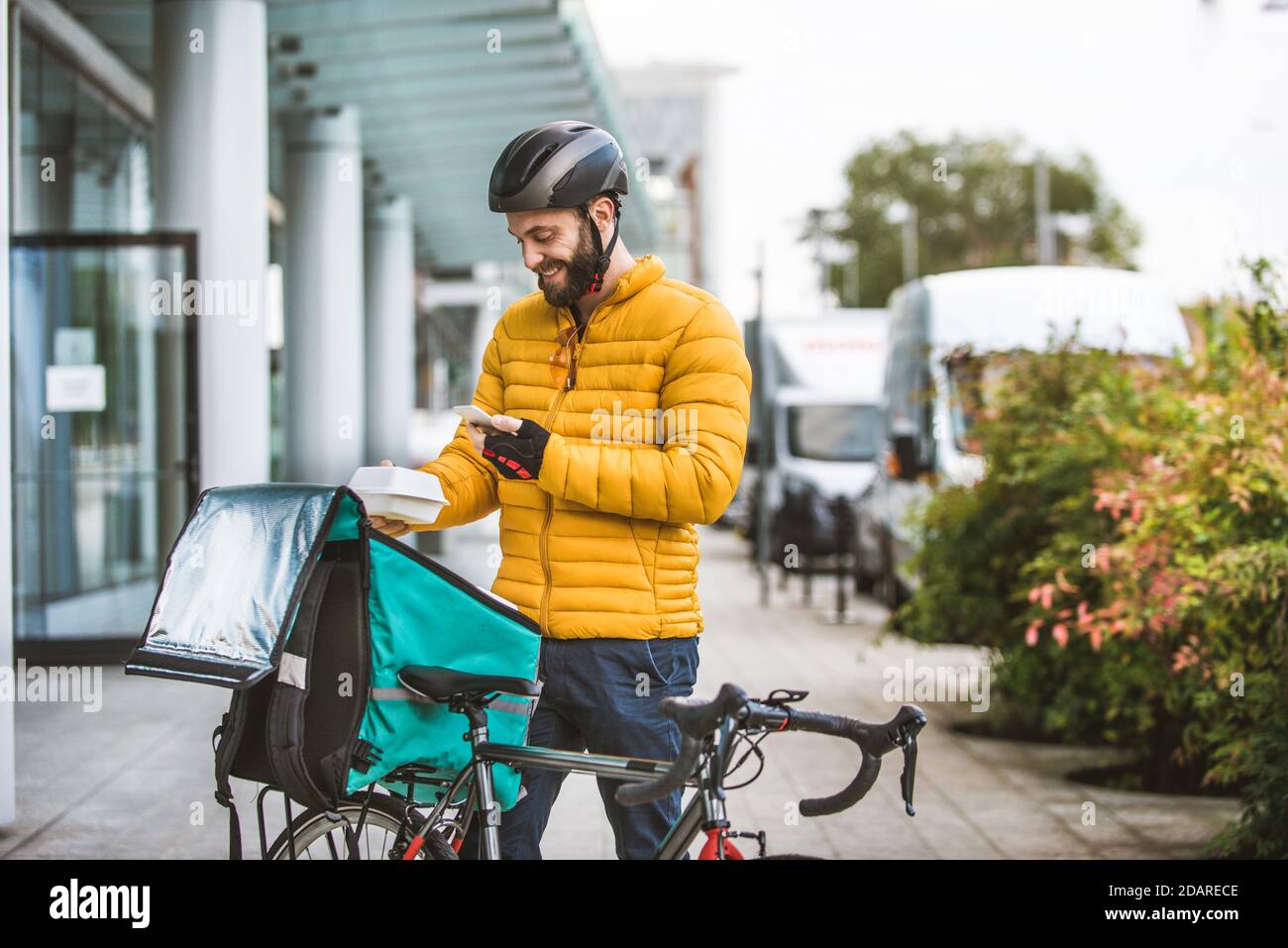Food delivery service, rider delivering food to clints with bicycle ...