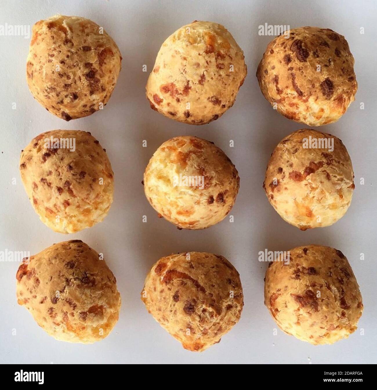 cheese bread balls on a white background Stock Photo - Alamy