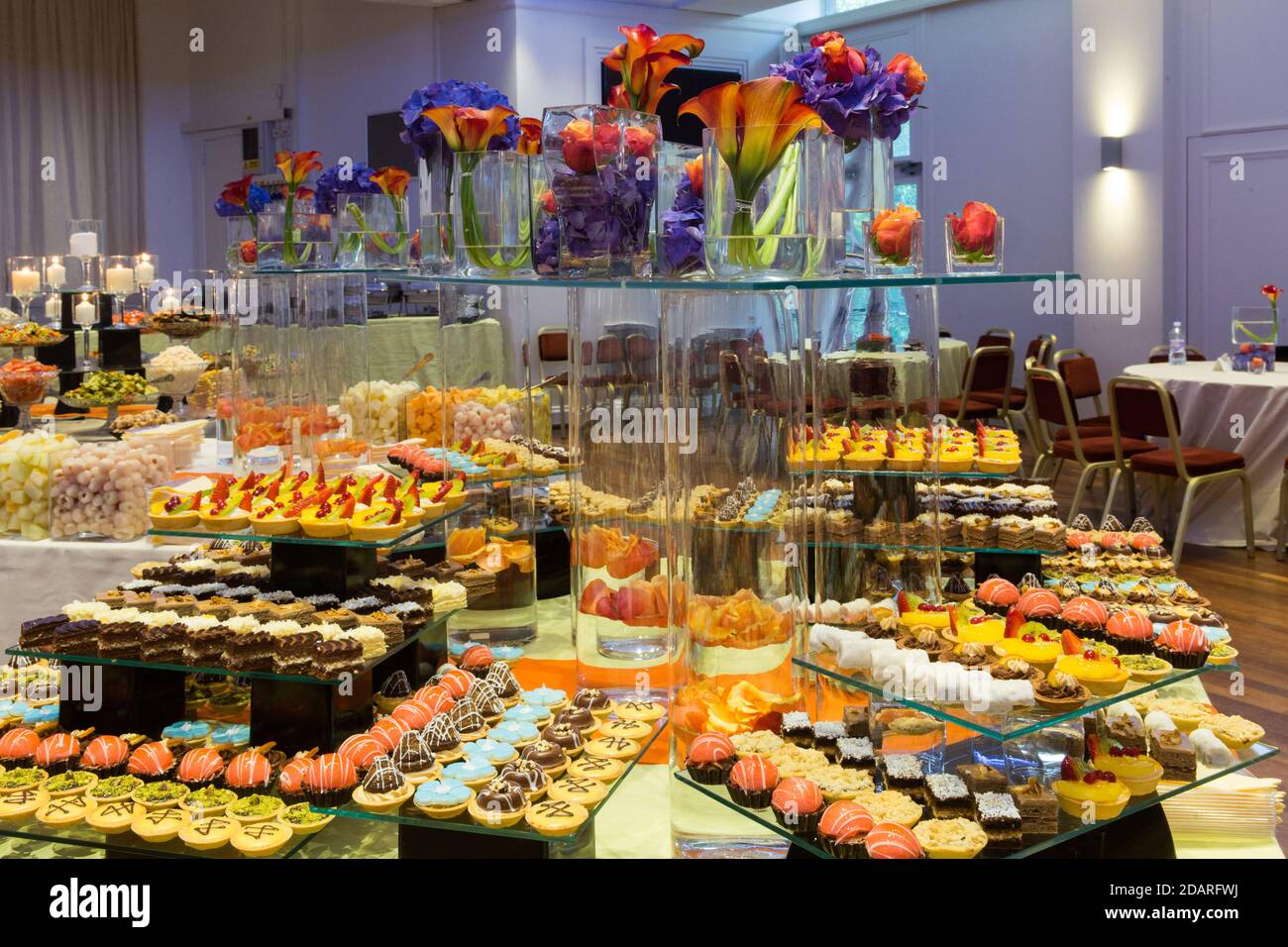 Cakes arrangement on table Stock Photo - Alamy
