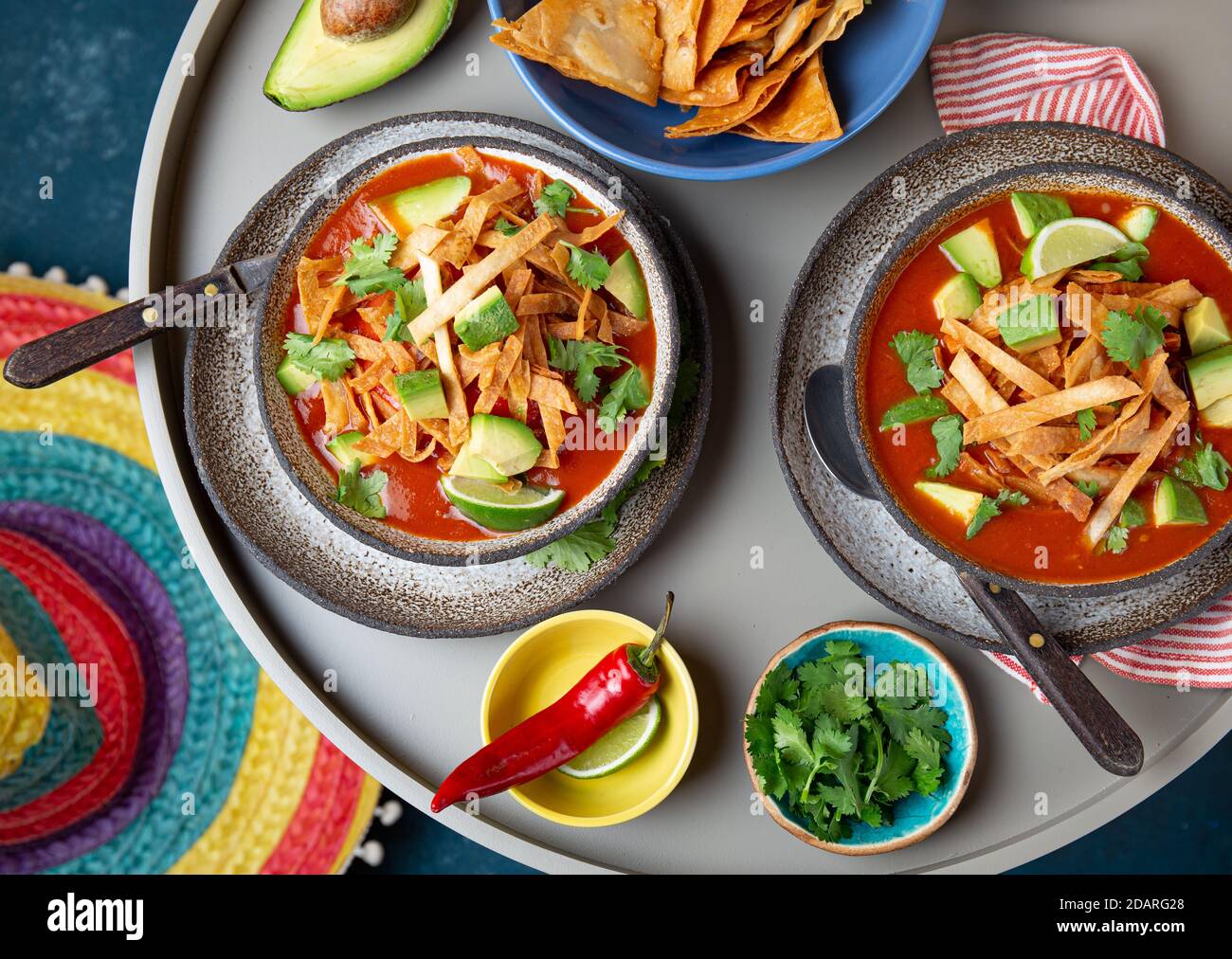 Mexican style table with spicy aztec soup with tortilla. Copy space ...