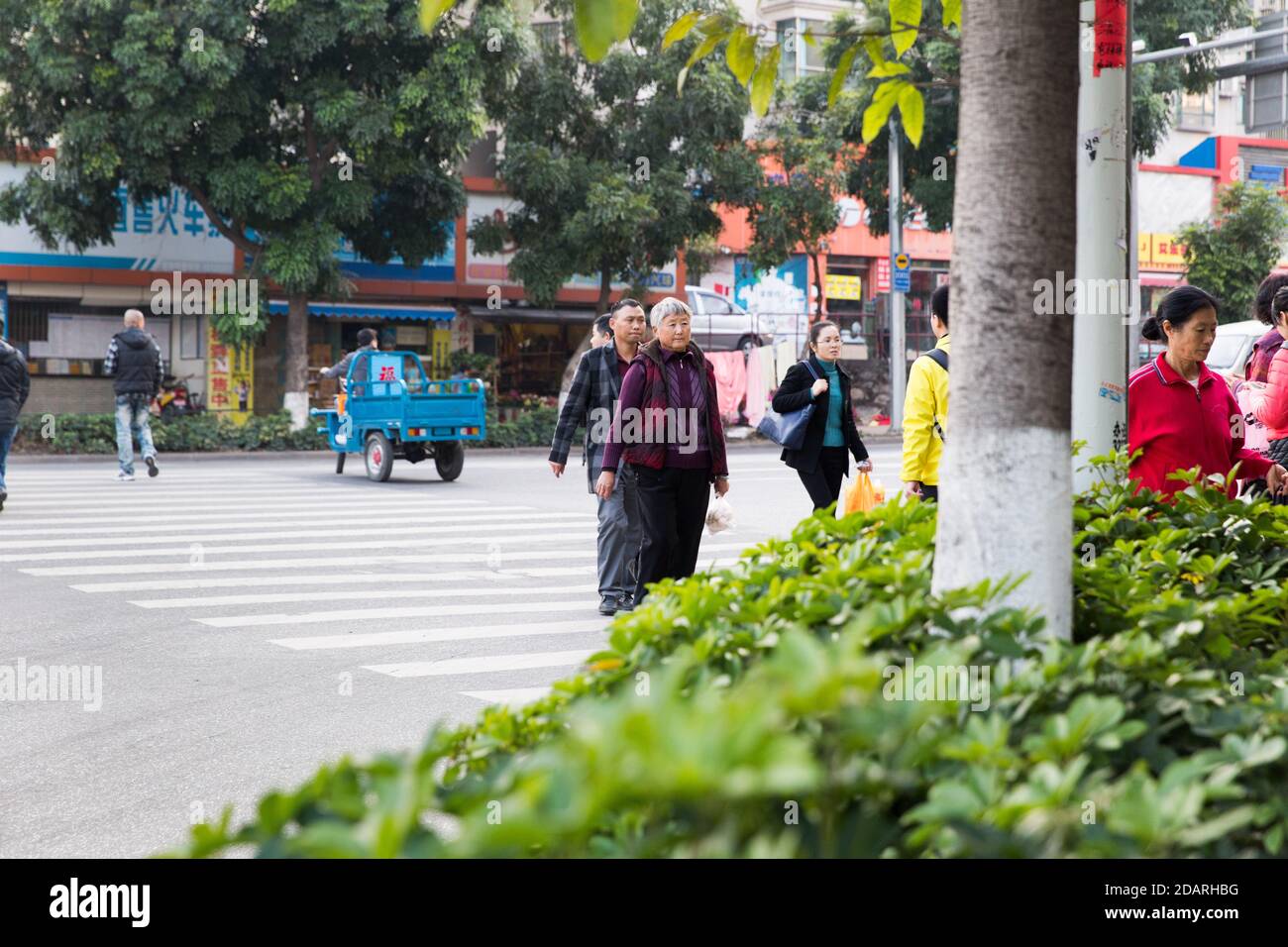 Guangzhou people walking hi-res stock photography and images - Alamy