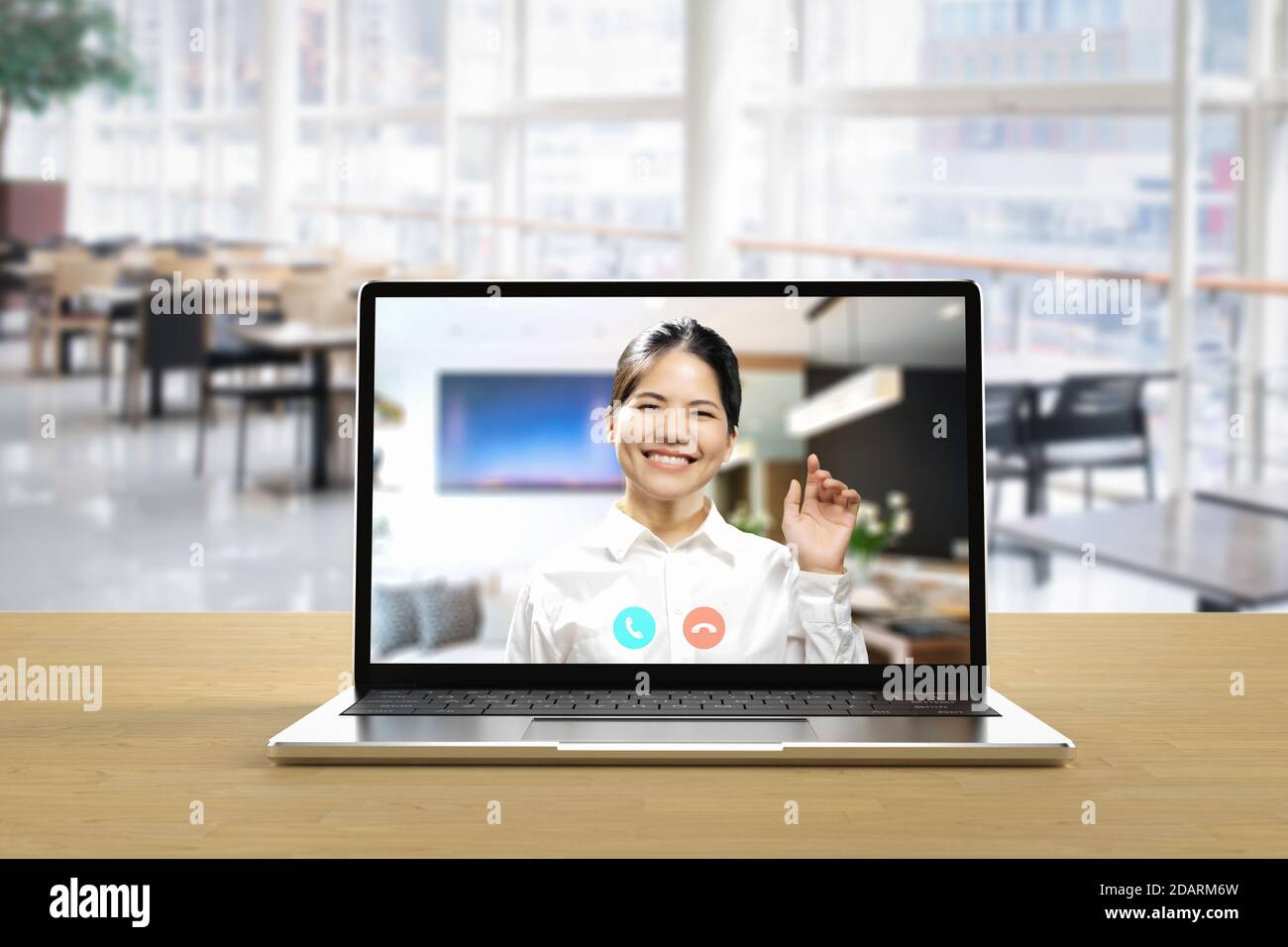 Online conference or video call with asian woman on computer notebook ...