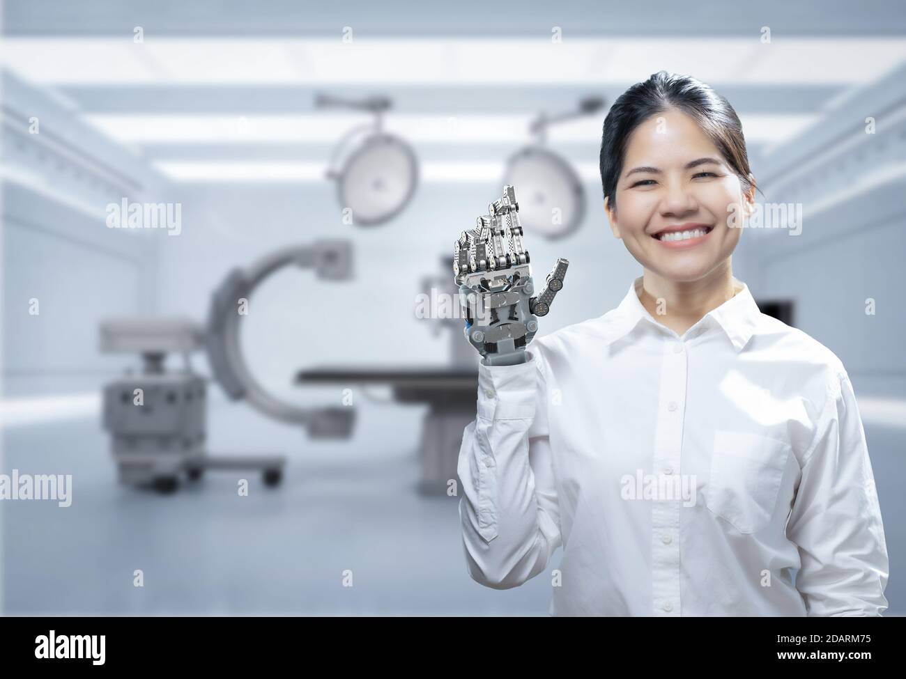 Asian woman with metal prosthetic hand Stock Photo - Alamy
