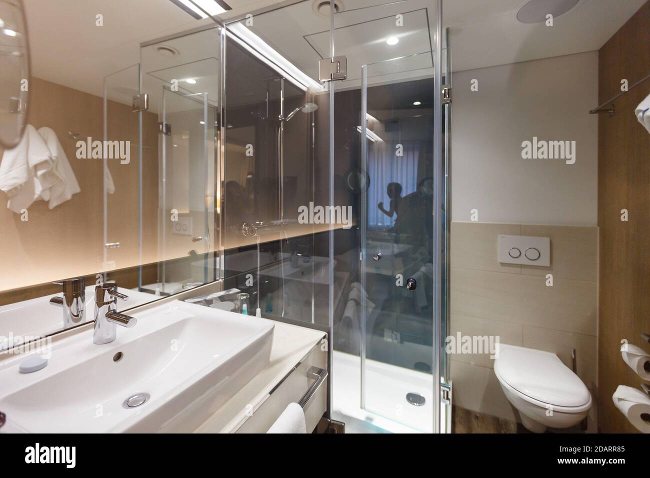 modern bathroom with white ceramic appliances and shower cabin Stock ...