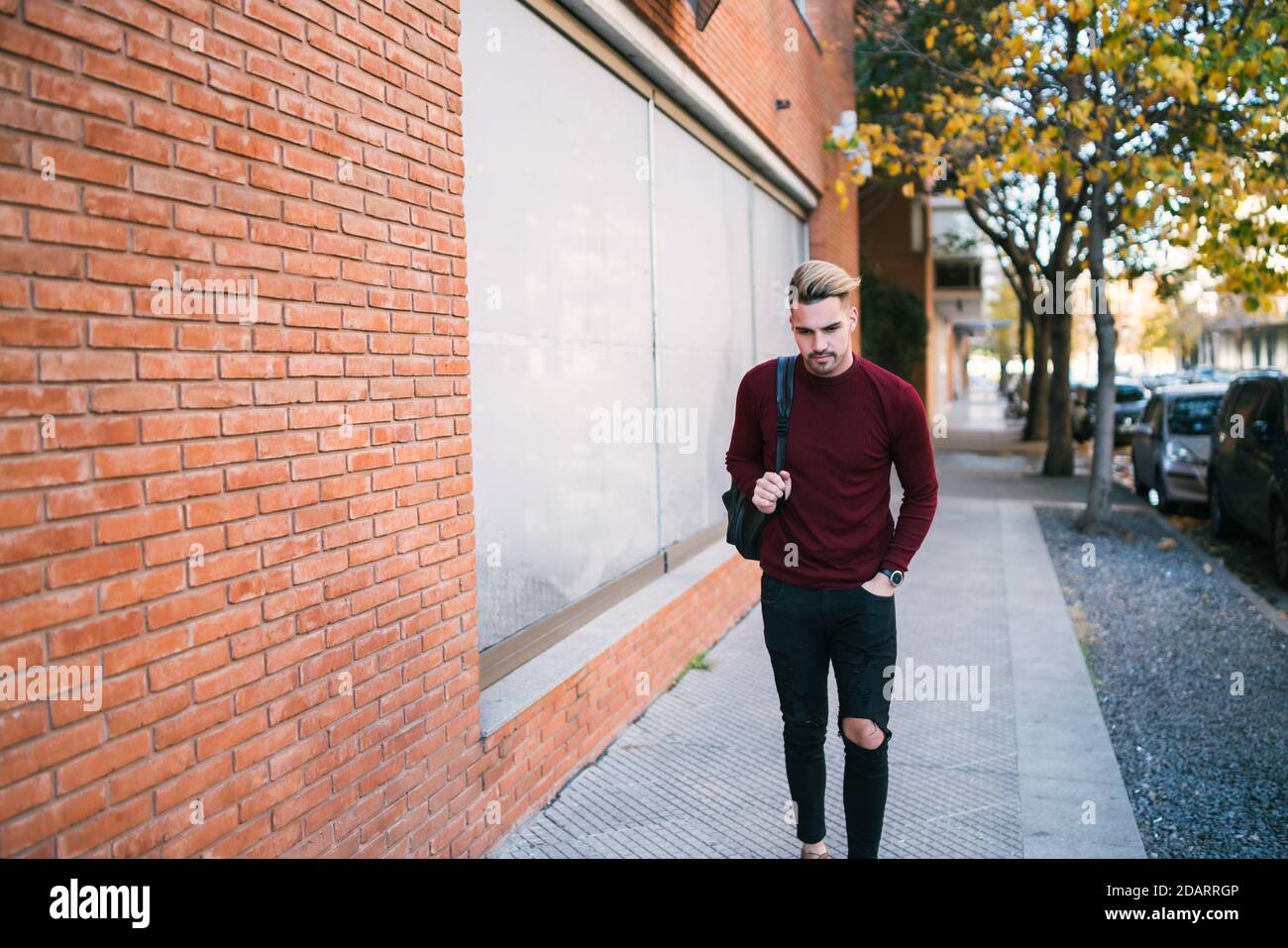 man walking on the street Stock Photo - Alamy