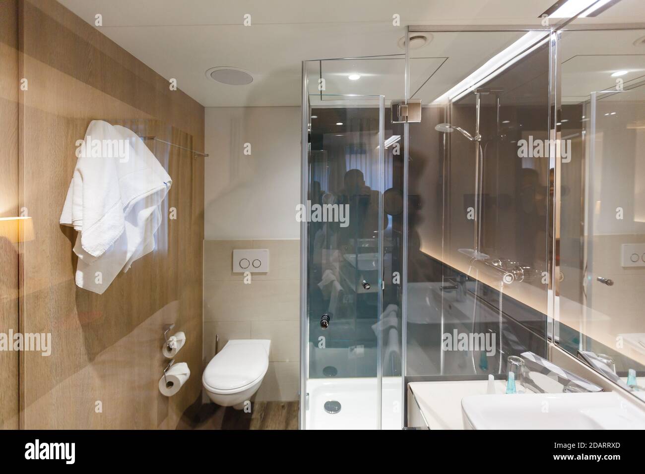 modern bathroom with white ceramic appliances and shower cabin Stock ...
