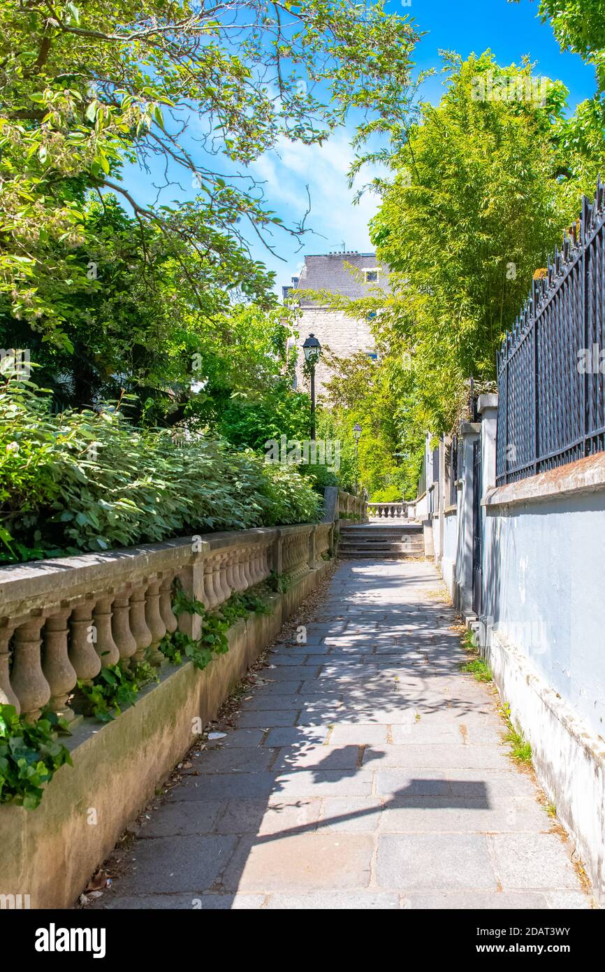 Paris, France, a typical pathway in Montmartre, charming place in ...