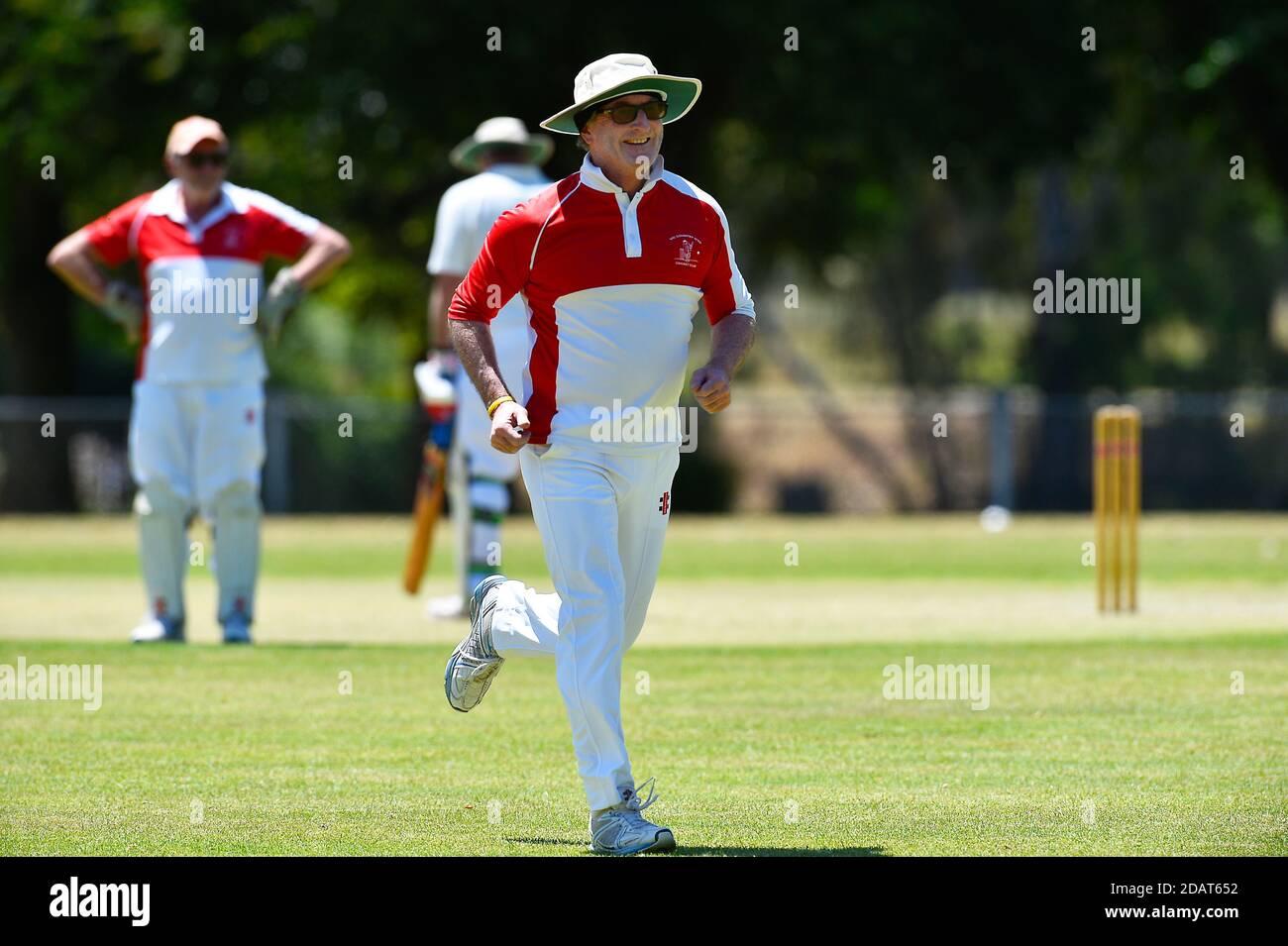 Cricketer red jumper hi-res stock photography and images - Alamy