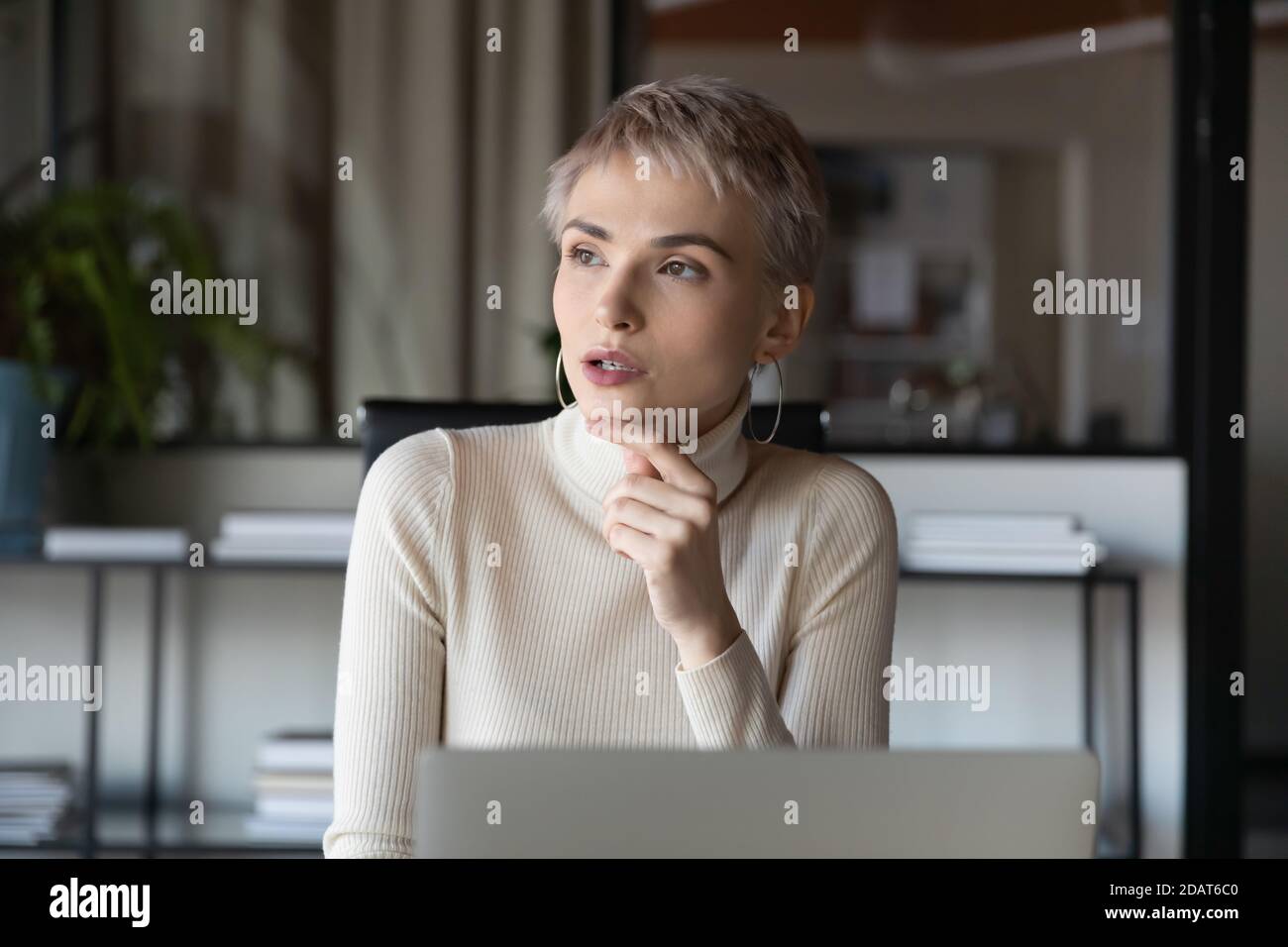 Pondering worker hi-res stock photography and images - Alamy