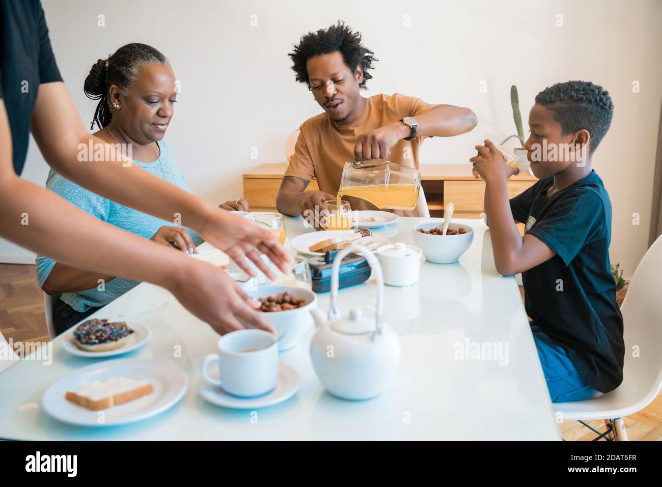 African mother child breakfast hi-res stock photography and images - Alamy