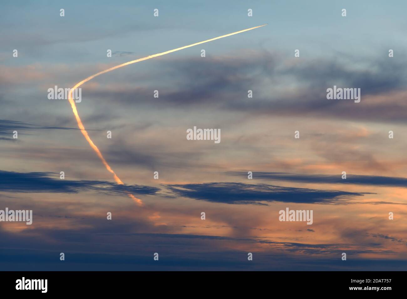 Plane contrail sunset hi-res stock photography and images - Alamy