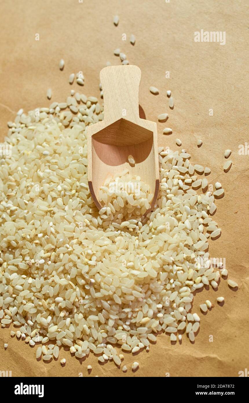 white rice is scattered on the table close up vertical format Stock ...