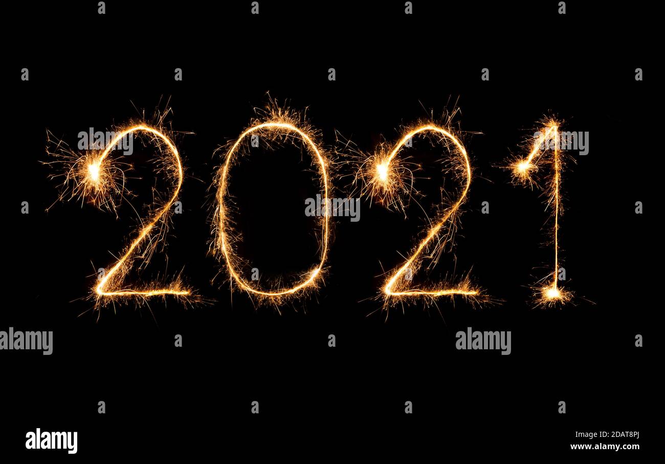 2021 happy new year fireworks written sparkling sparklers at night ...