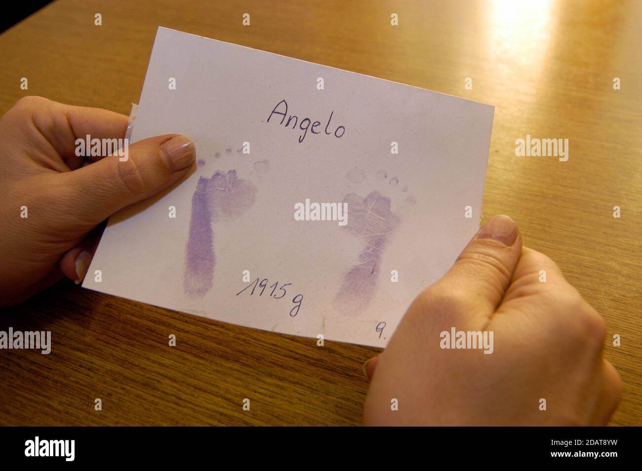 Baby footprints on paper hi-res stock photography and images - Alamy