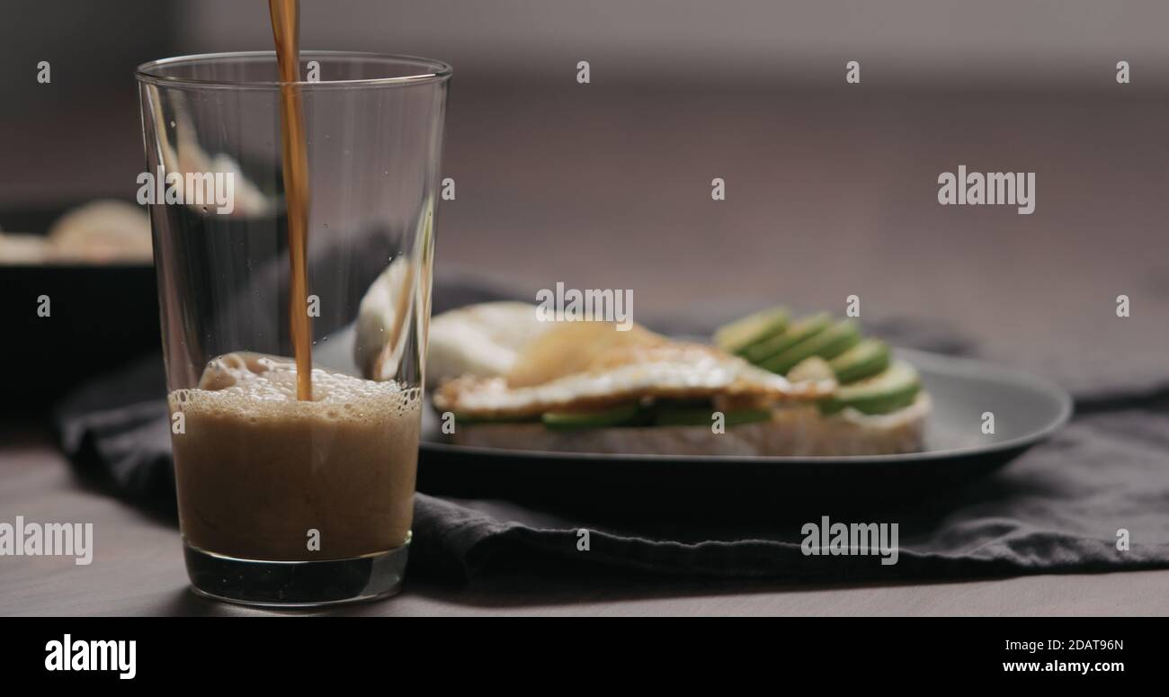 Slow motion pour beer glass hi-res stock photography and images - Alamy