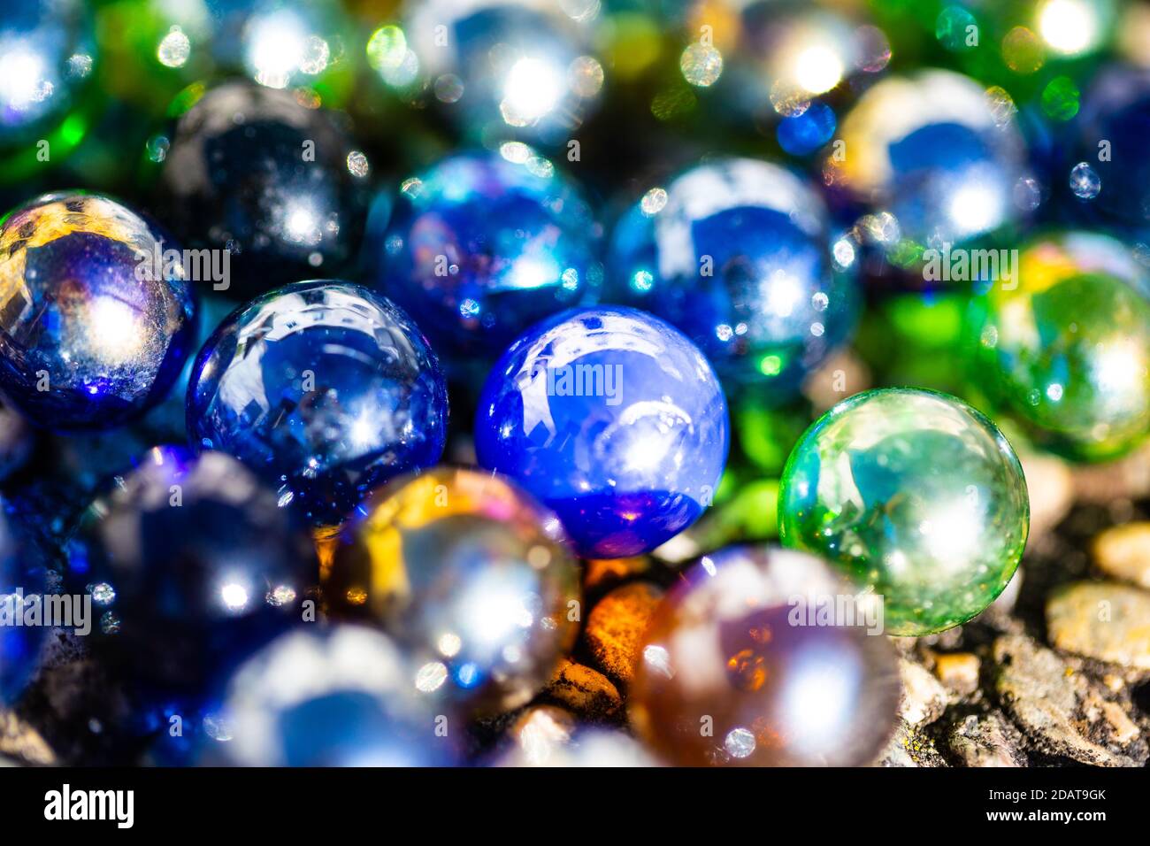 Playing marbles hi-res stock photography and images - Alamy