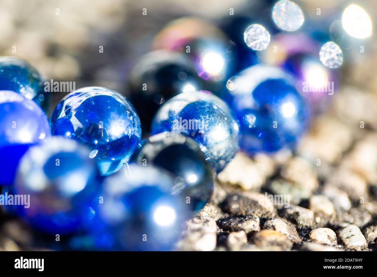 Playing marbles, old children's game, colorful balls Stock Photo - Alamy
