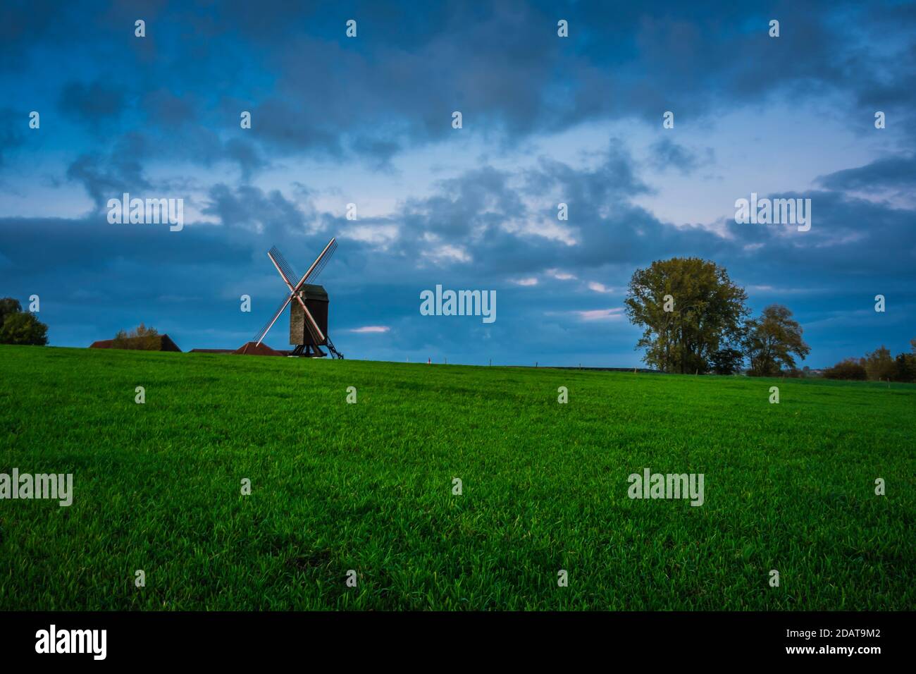 Landscape flanders region Tielt a place named Poelberg, windmill in ...