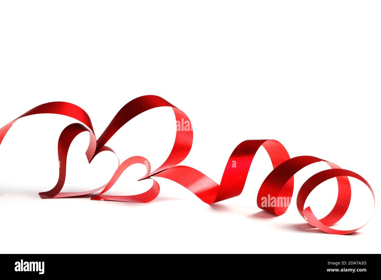 Heart shaped red ribbon isolated on white background Stock Photo - Alamy