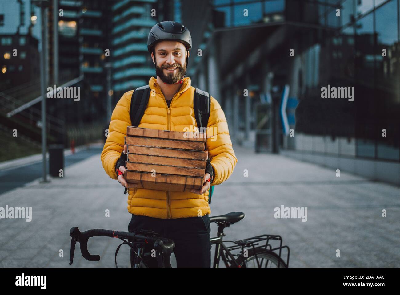 Food delivery service, rider delivering food to clints with bicycle ...