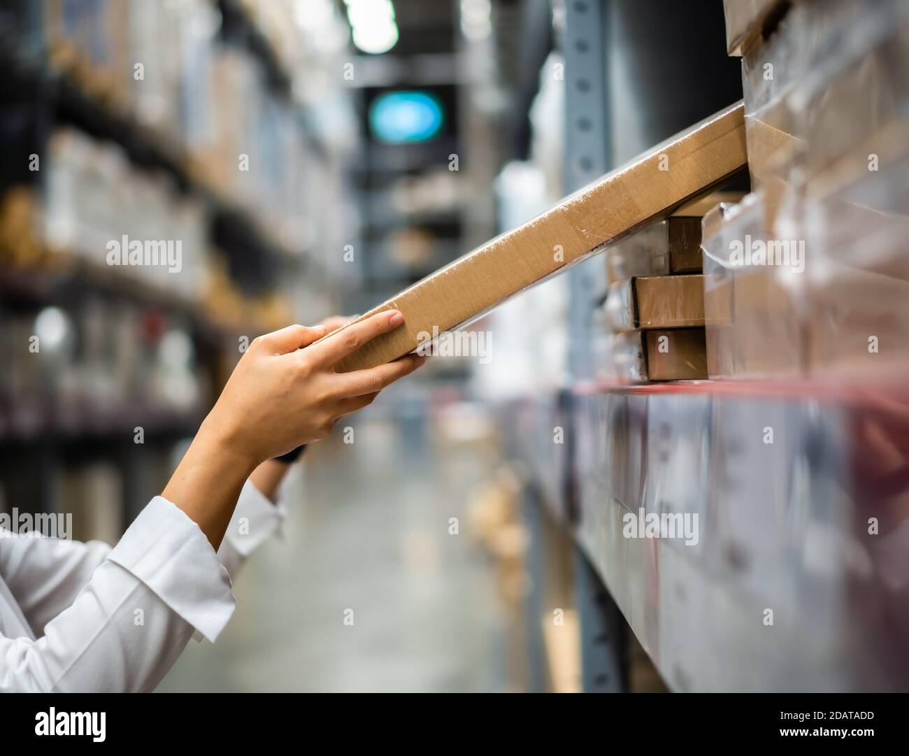 Hand picking up a factory hi-res stock photography and images - Alamy
