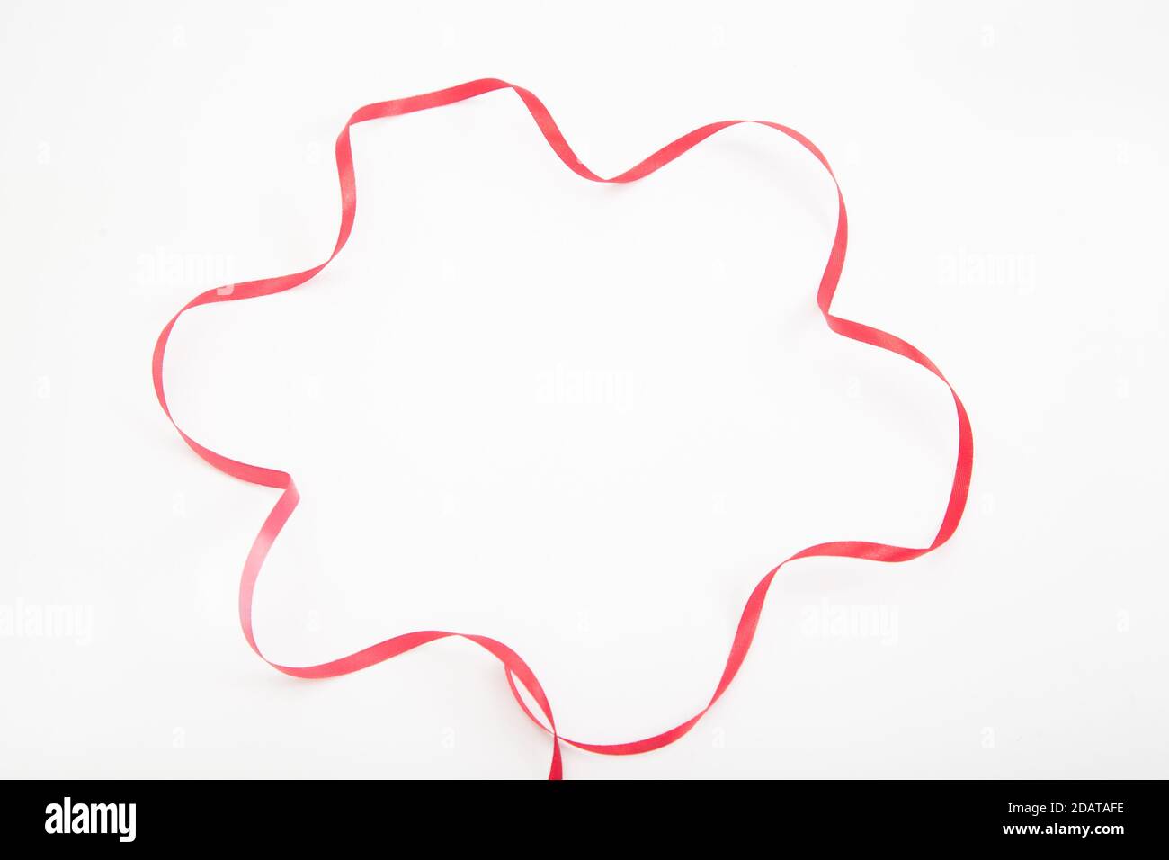 Red wavy ribbon hi-res stock photography and images - Alamy