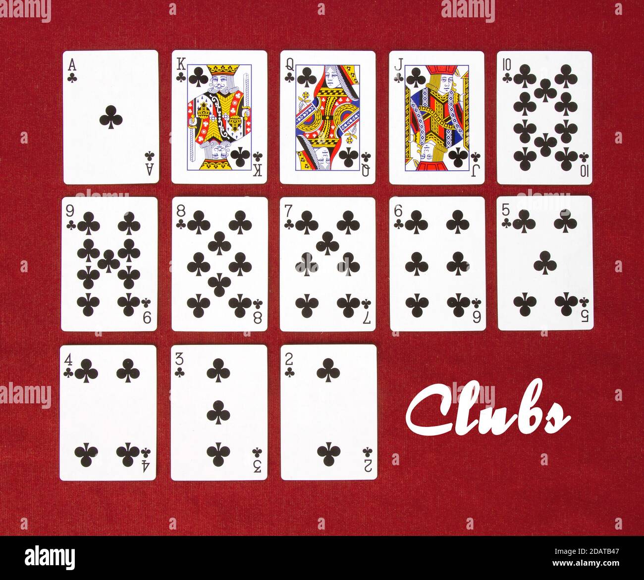Set of all clubs cards isolated on a red background Stock Photo - Alamy