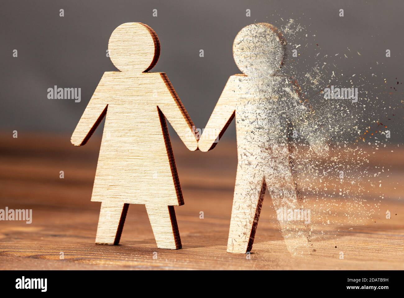 The concept is dead husband. Blowing ashes from deceased spouse Stock ...