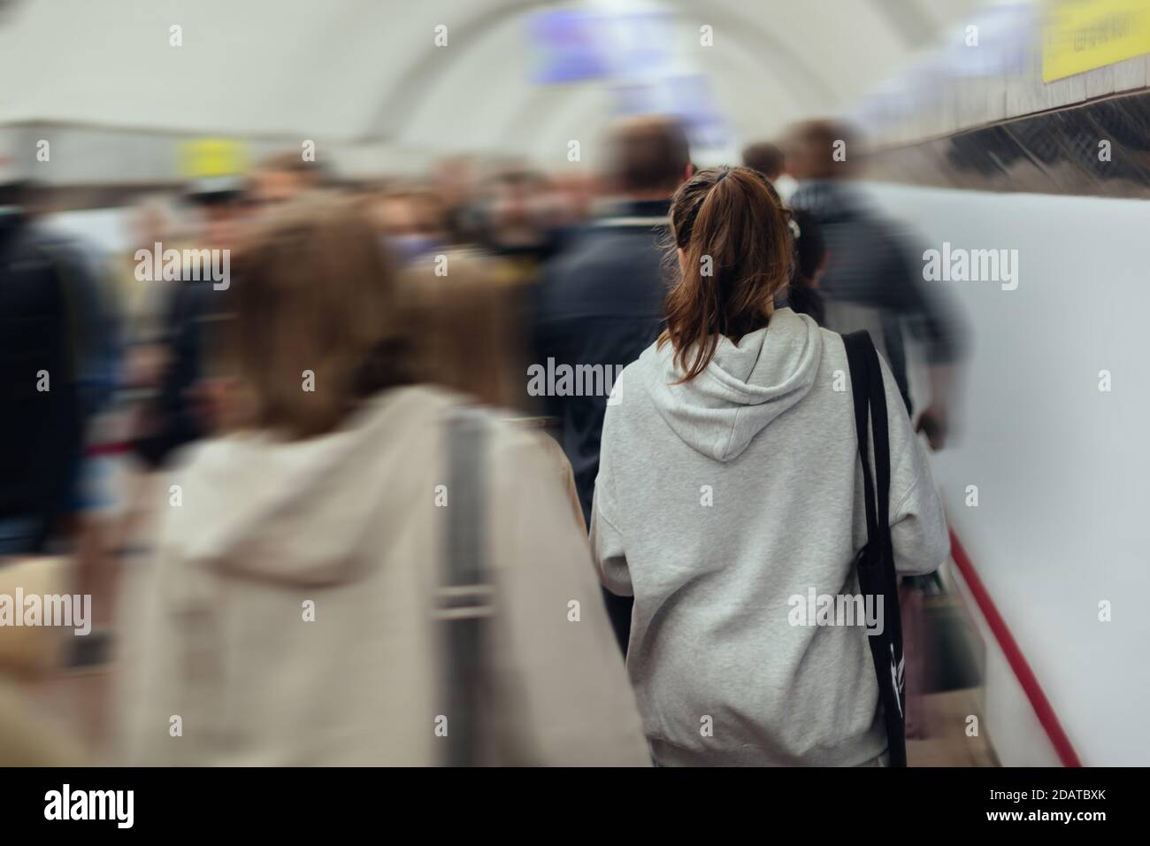 crowd of passengers in the subway crossing Stock Photo - Alamy