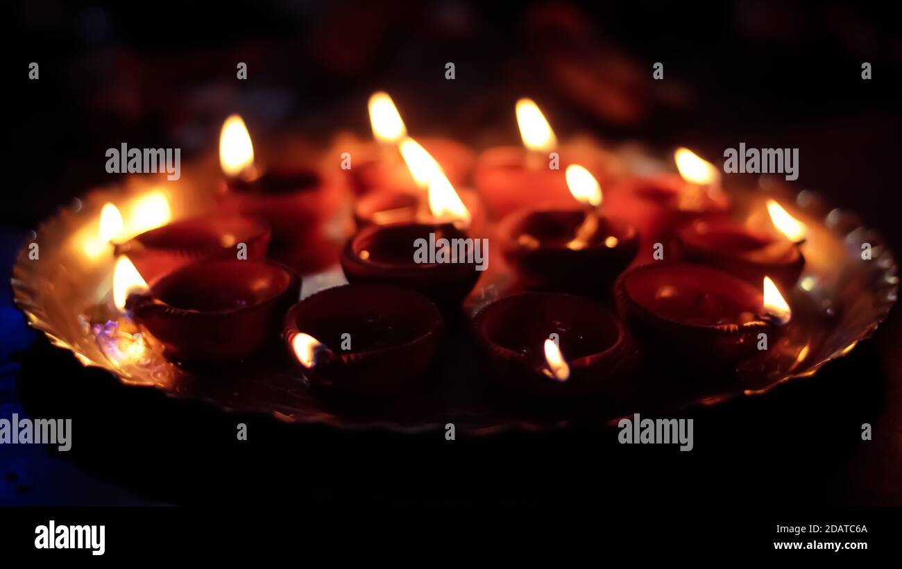 Traditional diya lighting hi-res stock photography and images - Alamy