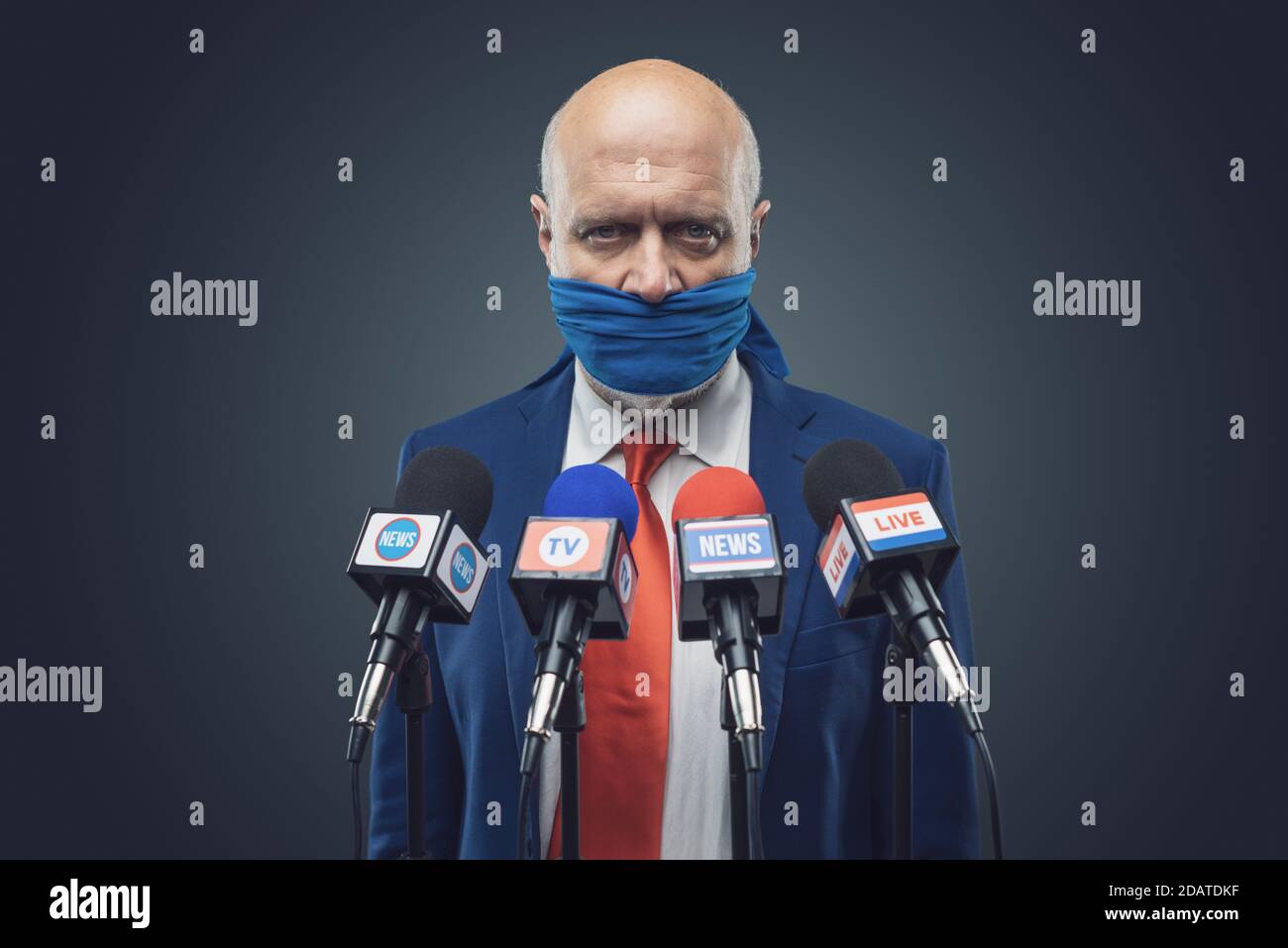 Angry politician with sealed mouth at the press conference, censorship ...