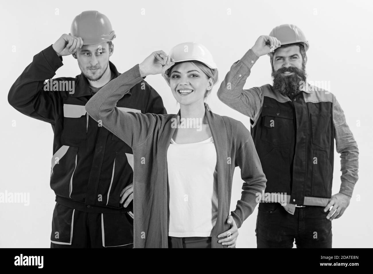 Team work concept. Builder, engineer, labourer, repairman as friendly ...