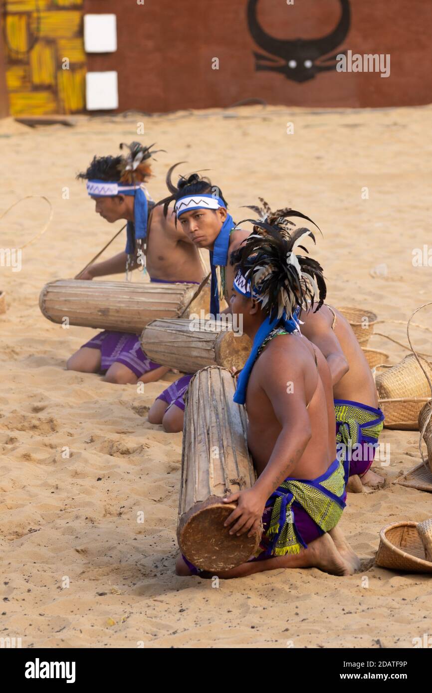 A group of young tribal boys of Nagaland playing their folk musical ...
