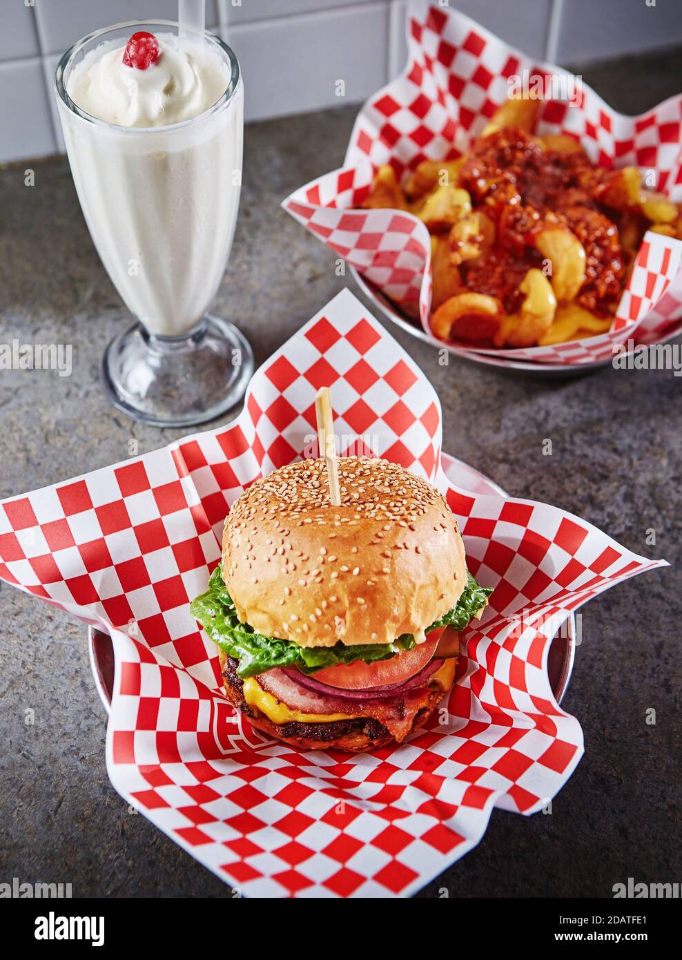 Hamburger served with french fries and milkshake Stock Photo - Alamy