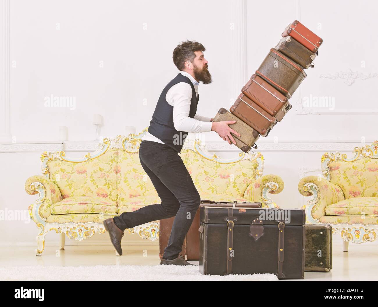 Dropped suitcase hi-res stock photography and images - Alamy