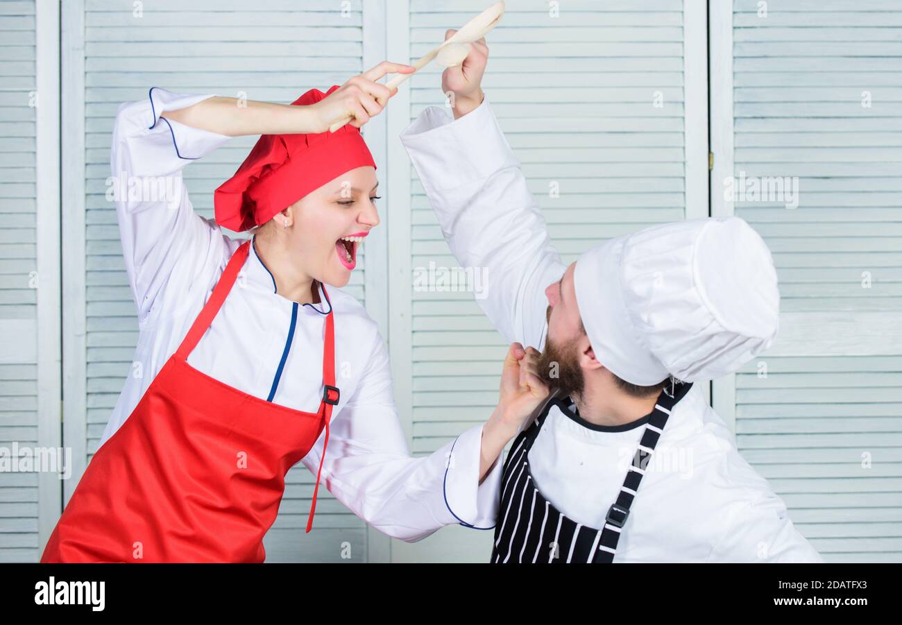 Culinary battle of two chefs. Couple compete in culinary arts. Kitchen ...