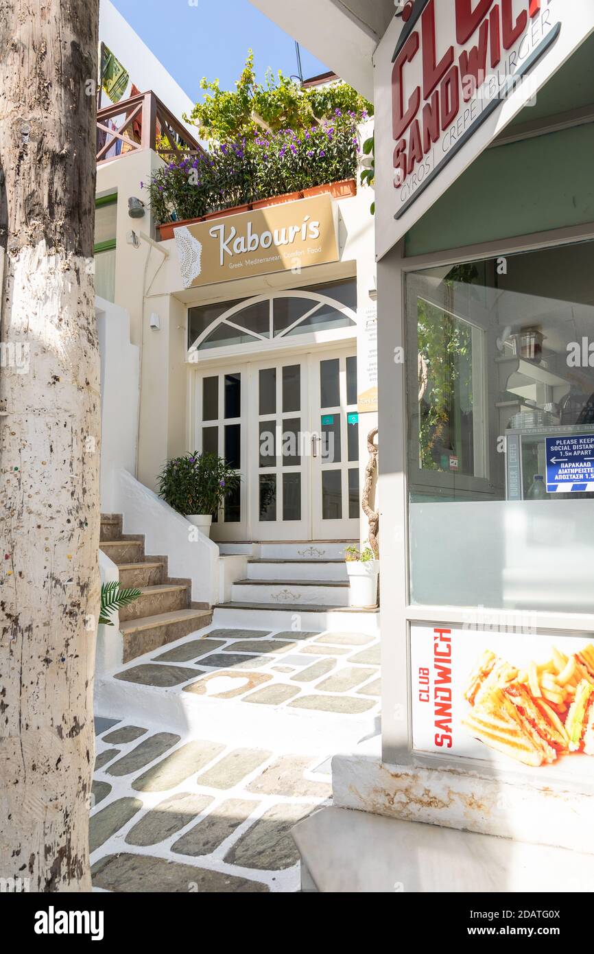 Chora, Ios Island, Greece- 20 September 2020: Narrow street of the old ...