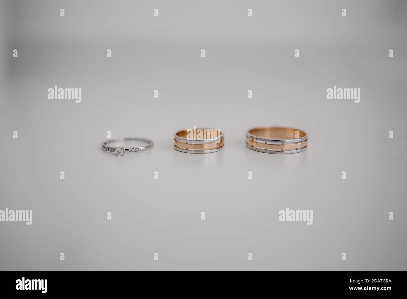 a wedding gold rings on the table close up Stock Photo - Alamy